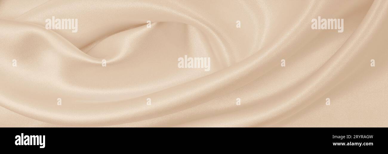 Smooth elegant golden silk or satin luxury cloth texture can use as ...