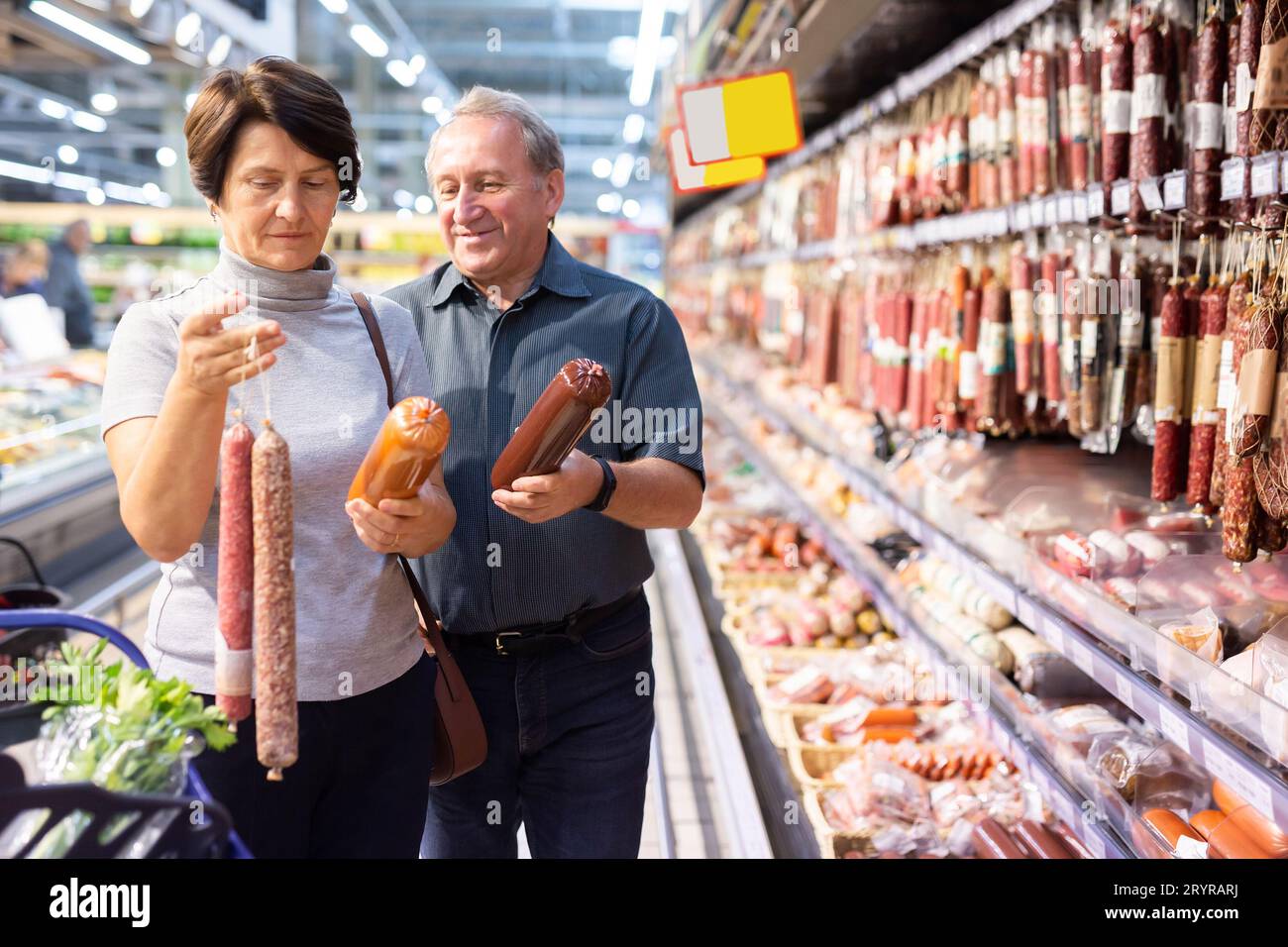Old woman groceries shelf hi-res stock photography and images - Alamy