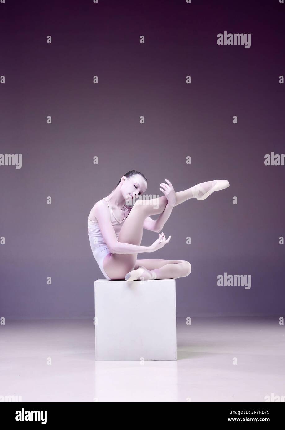 Statue art. Beautiful young woman, professional ballerina posing like ...