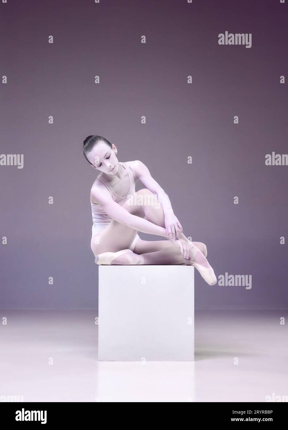 Statue art. Beautiful young woman, professional ballerina posing like ...