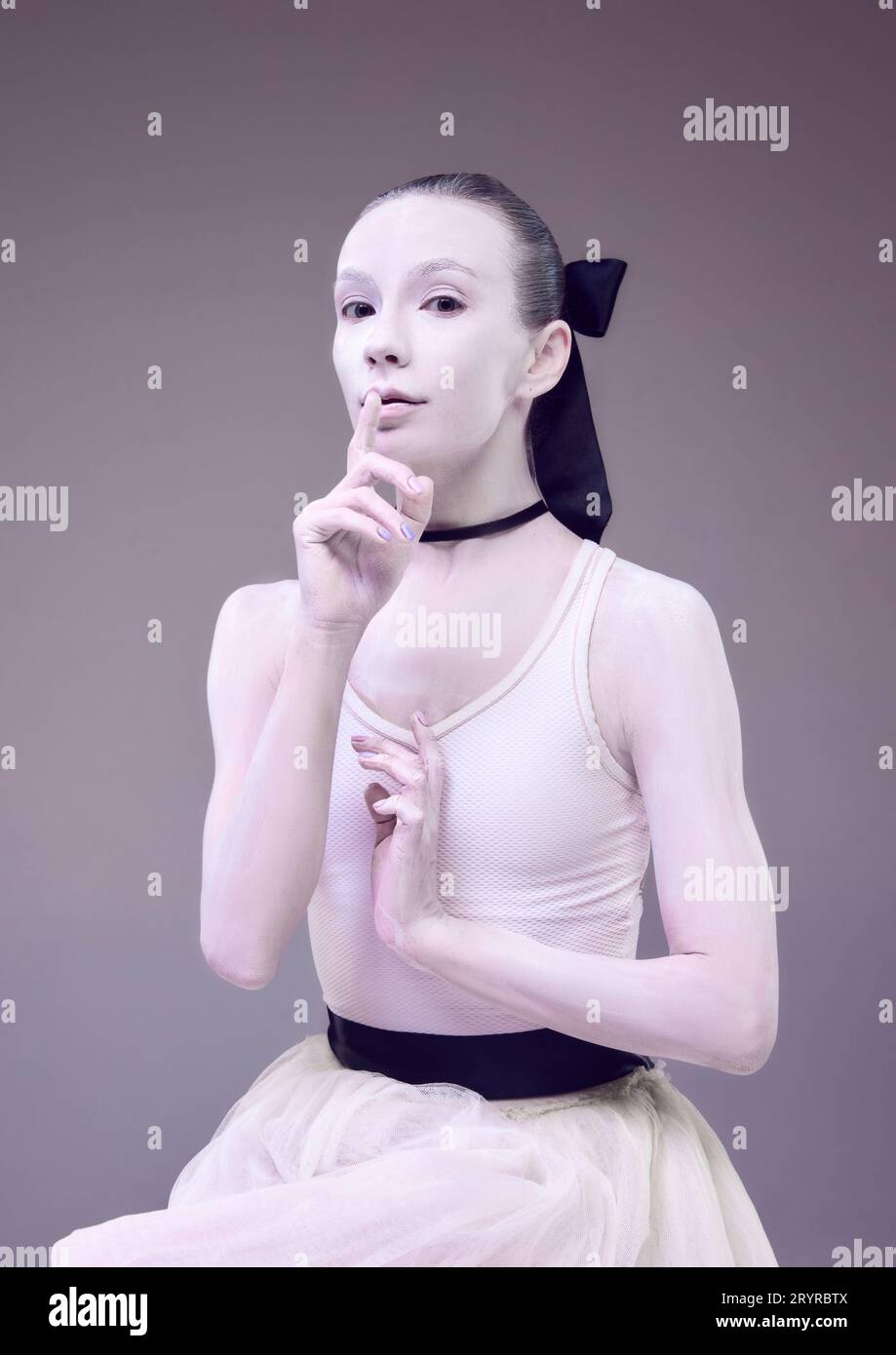 Secrets of fantasy. Portrait of beautiful young woman with pale makeup ...