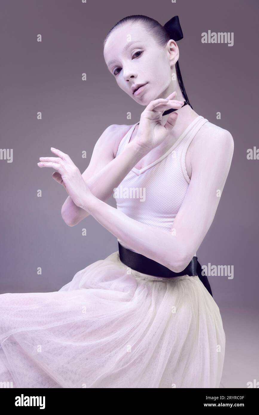 Porcelain statue art. Portrait of tender young woman, ballerina with pale look posing over ...