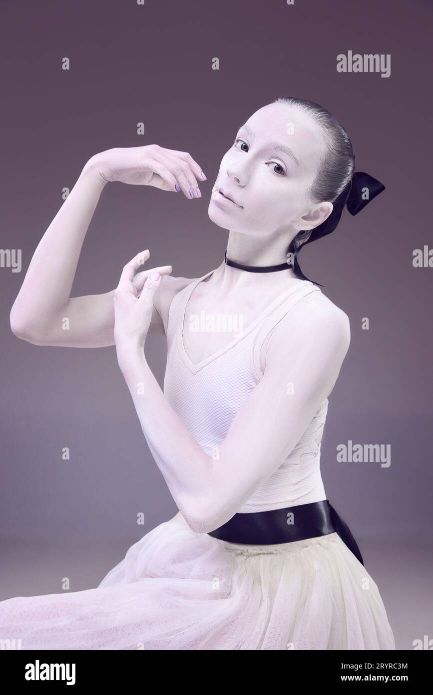 Porcelain statue art. Portrait of tender young woman, ballerina with pale look posing over ...