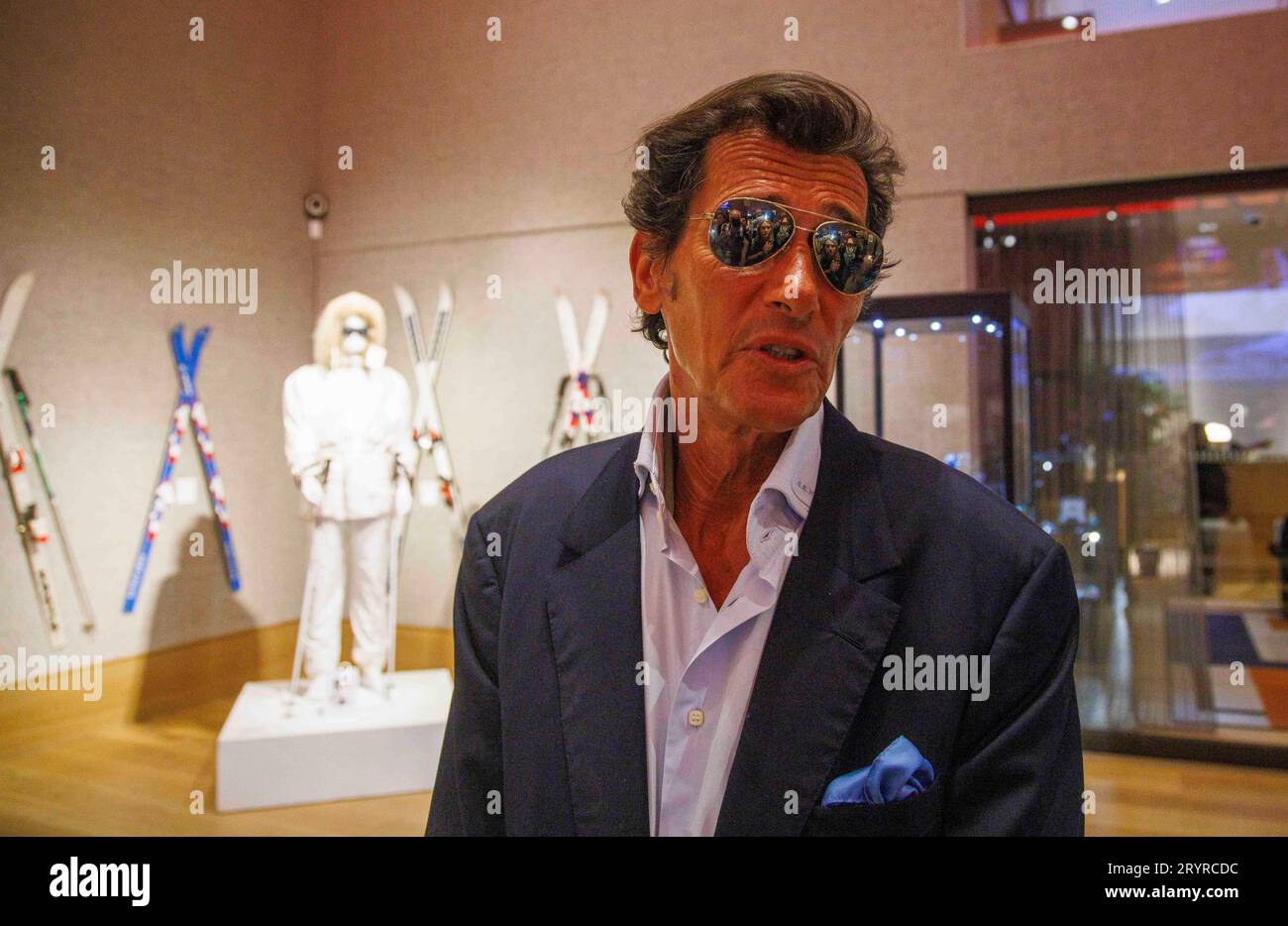 London, UK 2 Oct 2023 Roger MooreÕs son, Geoffrey, stands by a Bogner ...