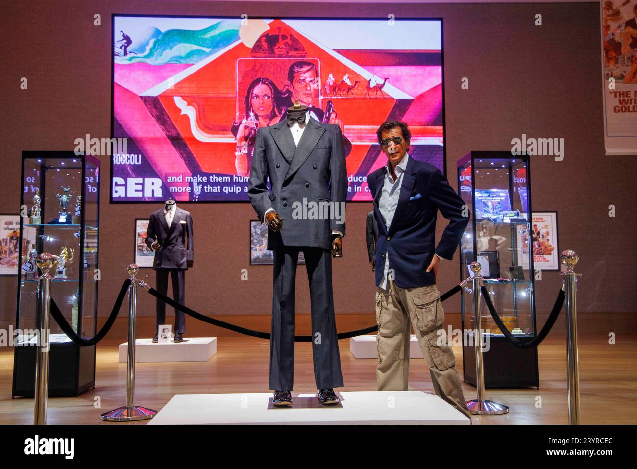 London, UK 2 Oct 2023 Roger MooreÕs son, Geoffrey, stands by a Double ...