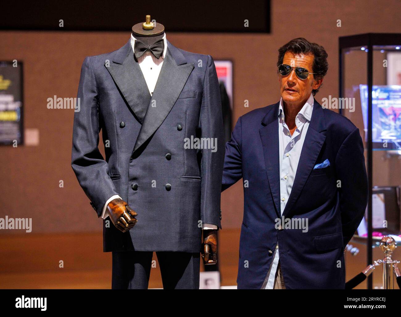 London, UK 2 Oct 2023 Roger MooreÕs son, Geoffrey, stands by a Double ...