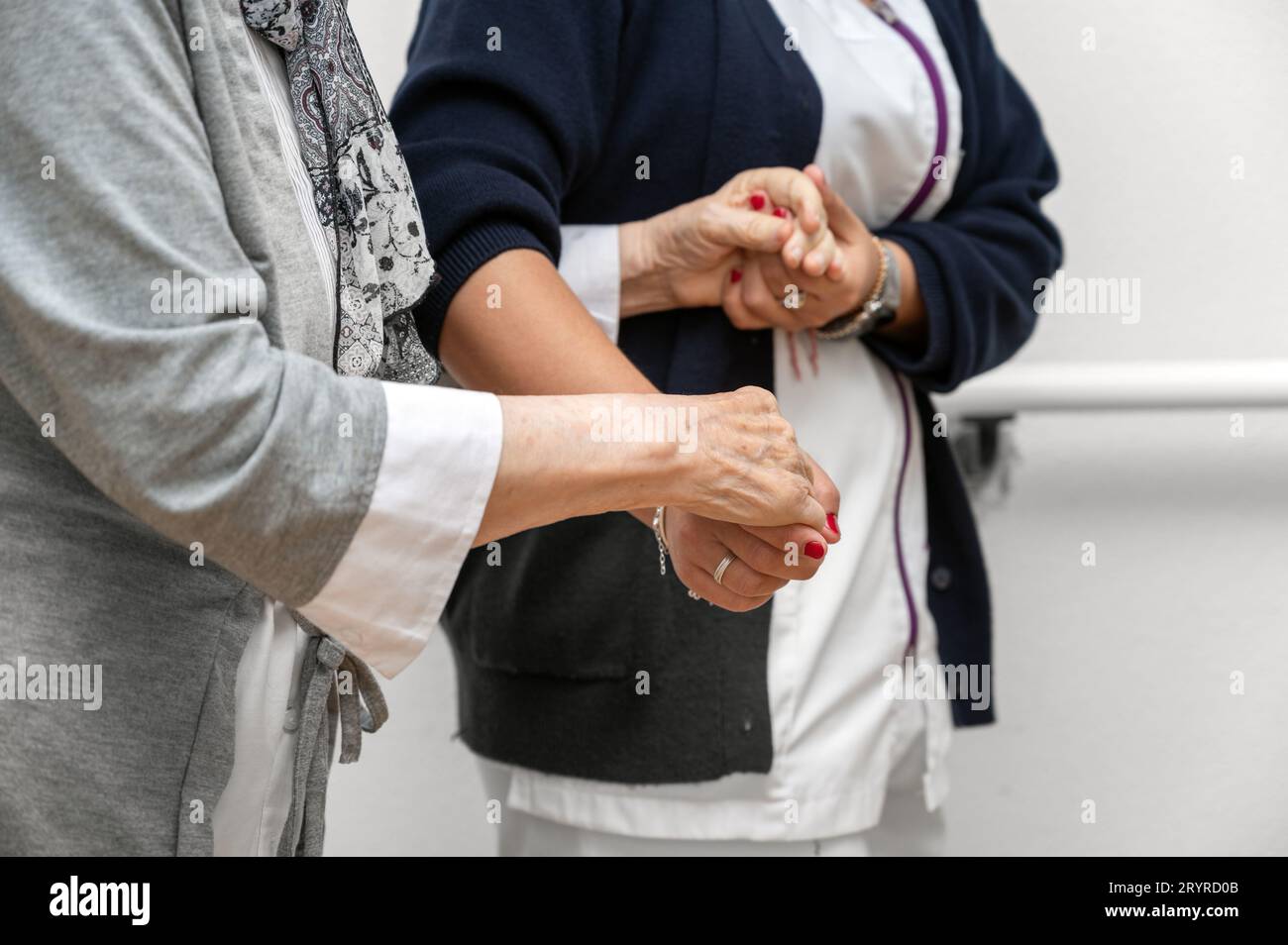 Helping hand to walk hi-res stock photography and images - Alamy