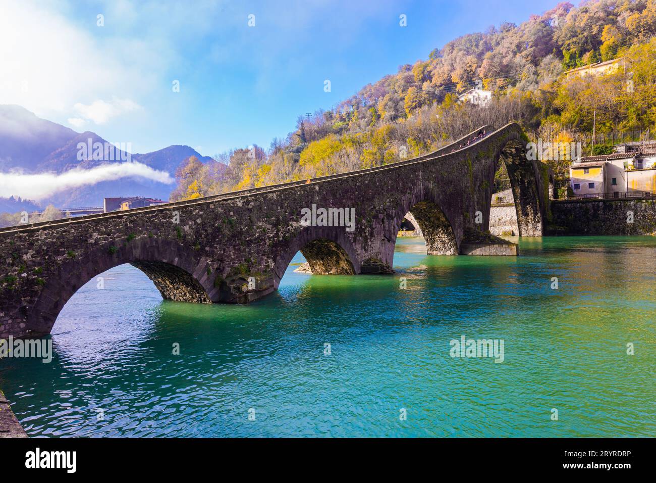 The old name of the bridge is Devil's Bridge. Italy, Lucca. The emerald ...