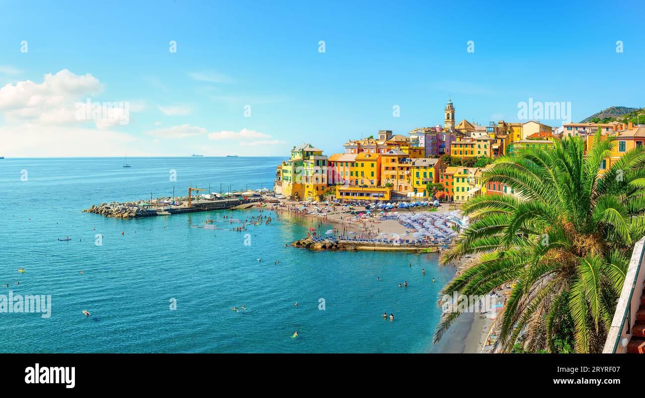 Sandy beach and architecture of bogliasco town hi-res stock photography ...
