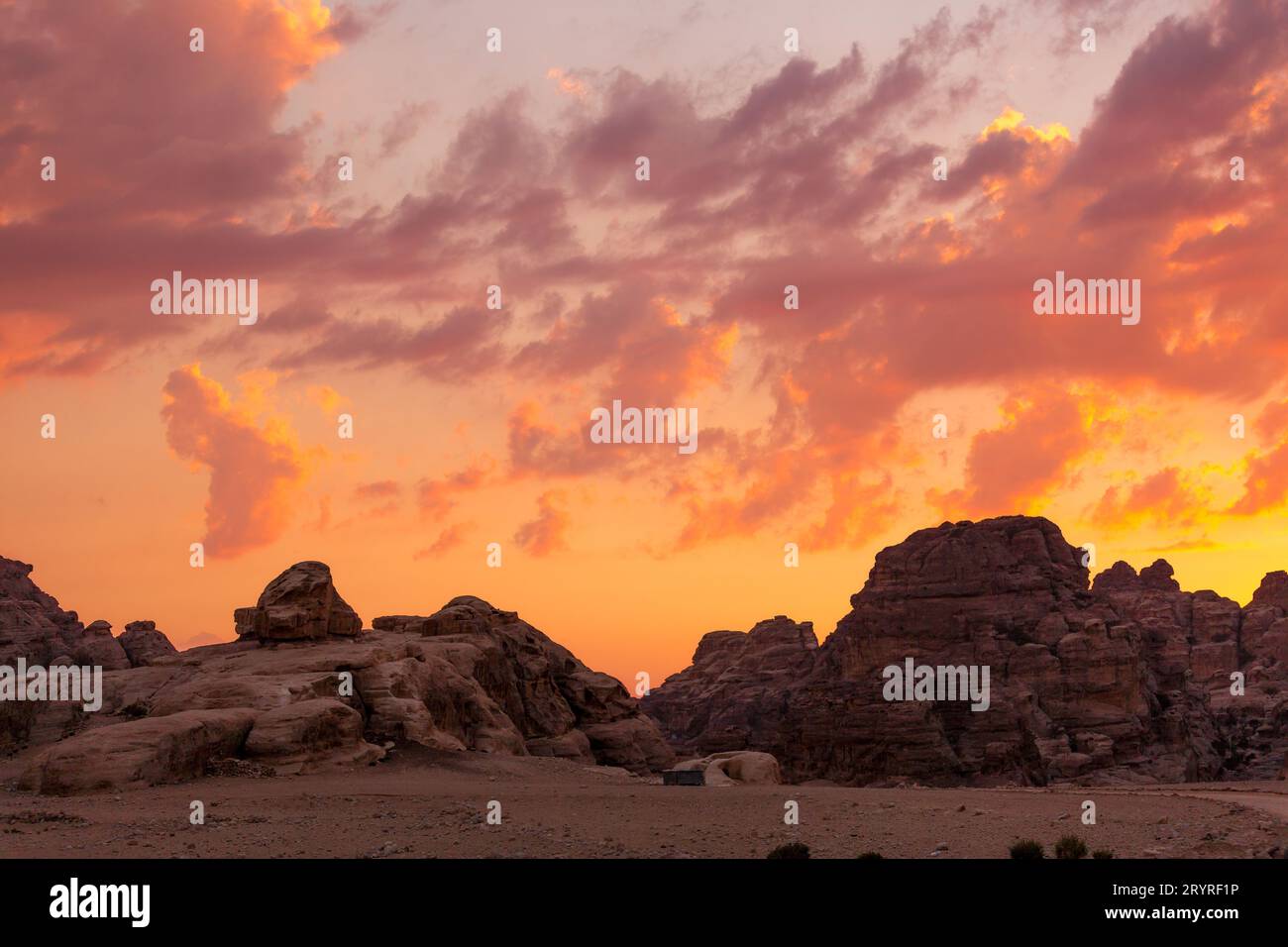Colorful sunset sky, rocks in Little Petra, Jordan Stock Photo - Alamy