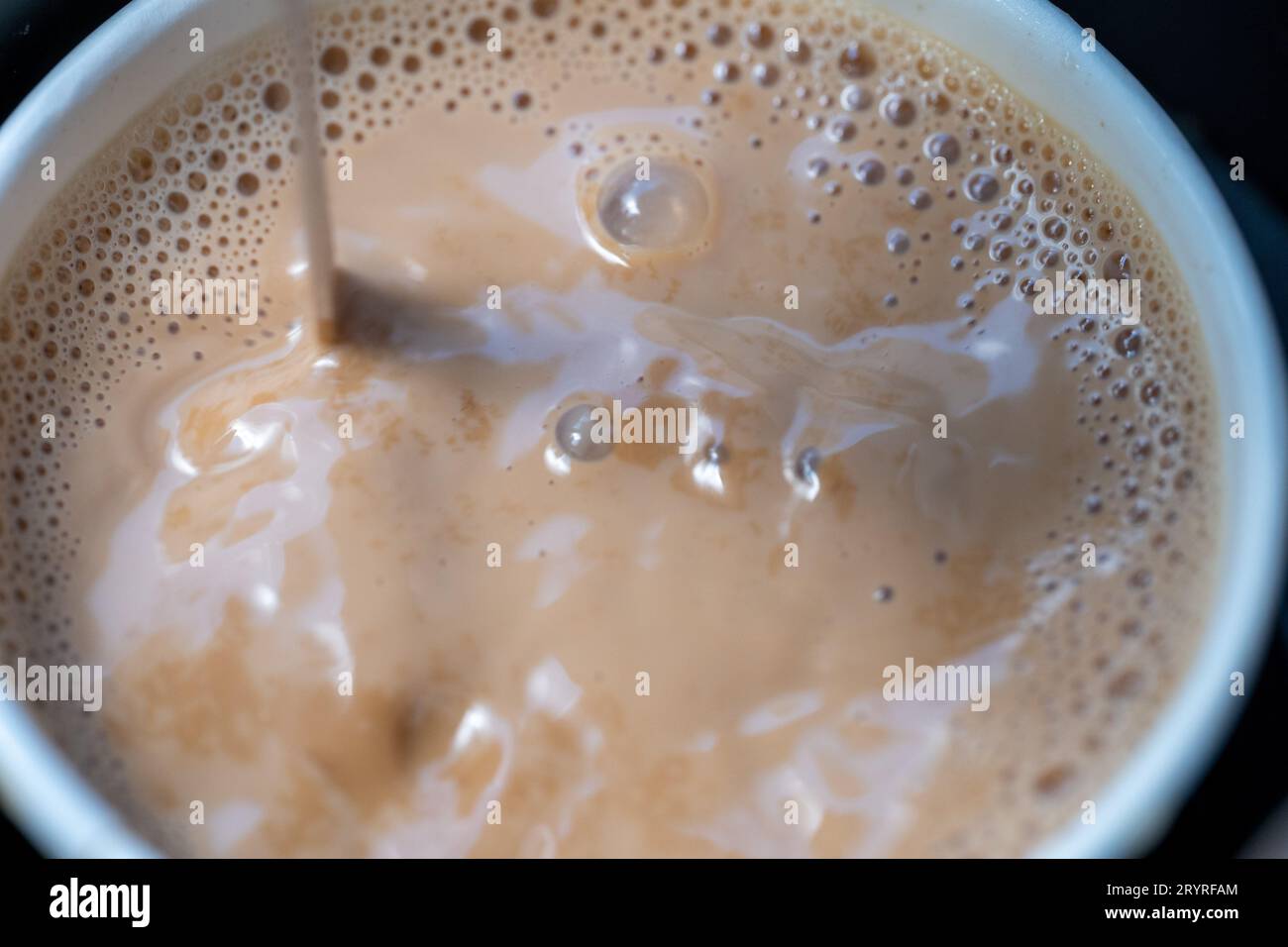 Macro Photo of Stirring Pakistani Chai Stock Photo - Alamy