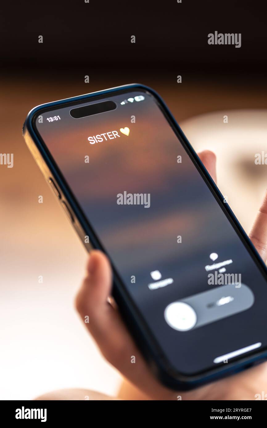 Smartphone in child hands with Incoming sister call on a screen Stock ...