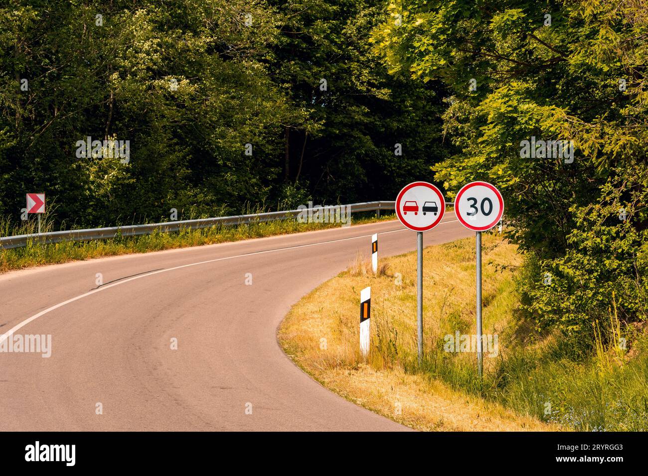 Prohibition road sign No Overtaking and road sign Speed Limit on the ...