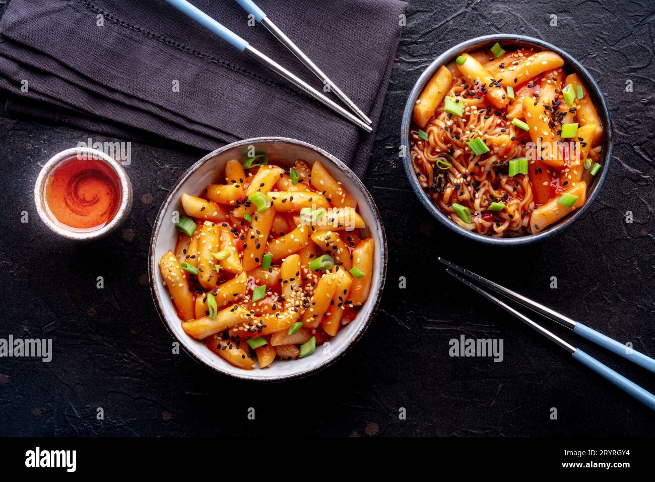 Tteokbokki or topokki and rabokki, Korean street food, spicy rice cakes ...