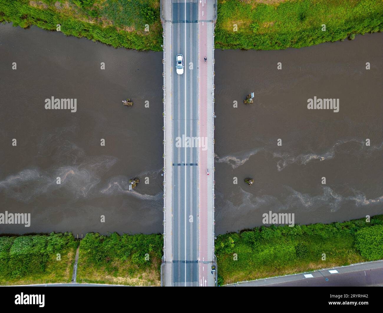 Aerial view, pov directly above bridge with little car traffic. Slow Aerial Birds Eye Overhead ...