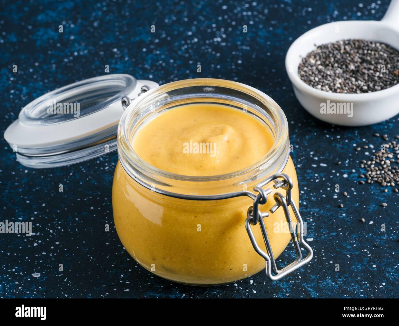 Vegan creamy cheddar cheese sauce with chia seeds Stock Photo - Alamy