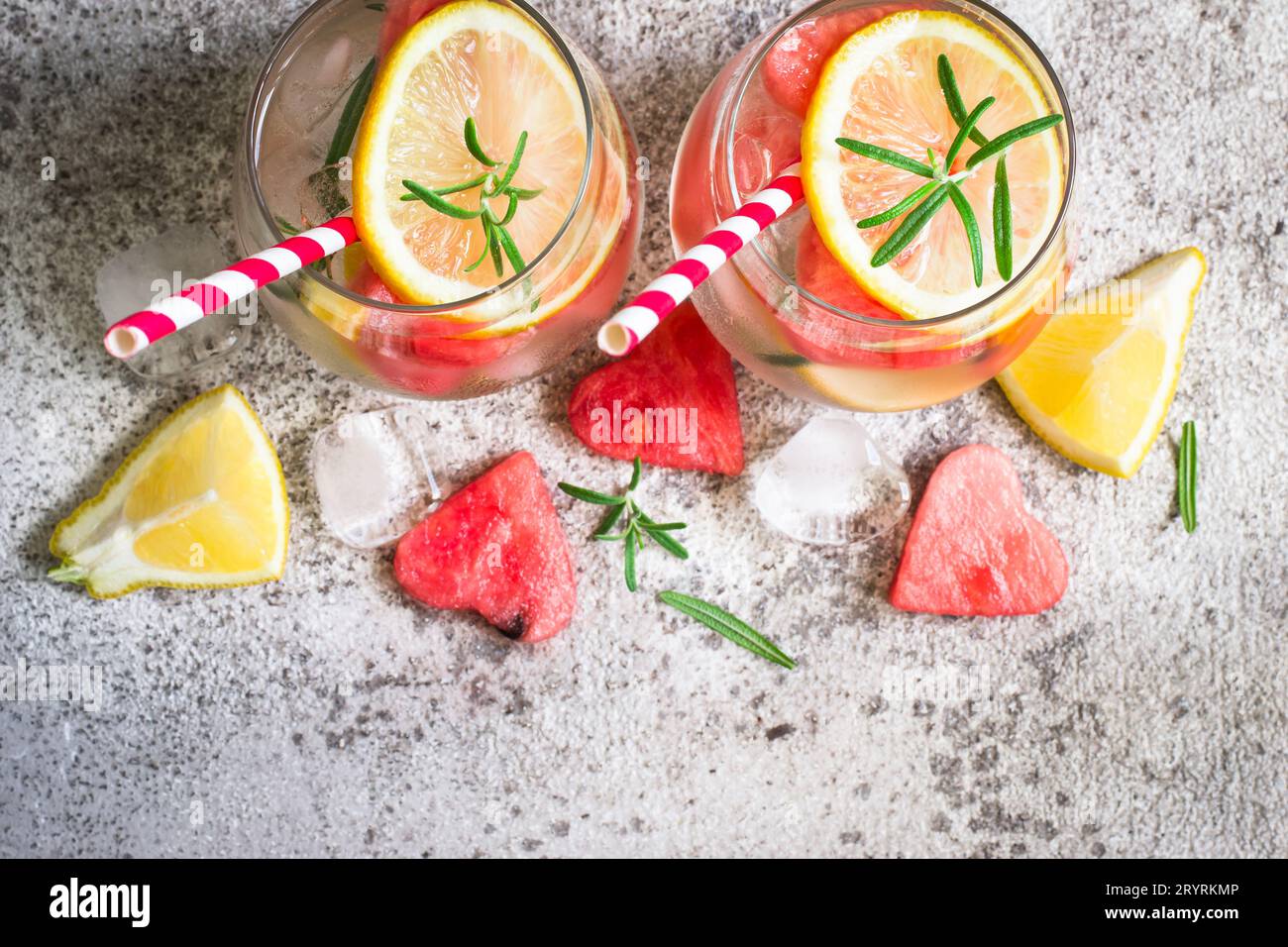 Watermelon lemon lemonade with pieces of watermelon in shape of heart. Refreshing summer drink ...