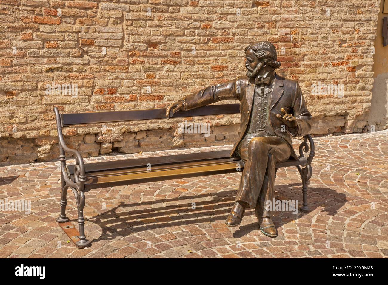 Statue of Giuseppe Verdi sitting on a bench in Parma. Italy Stock Photo ...