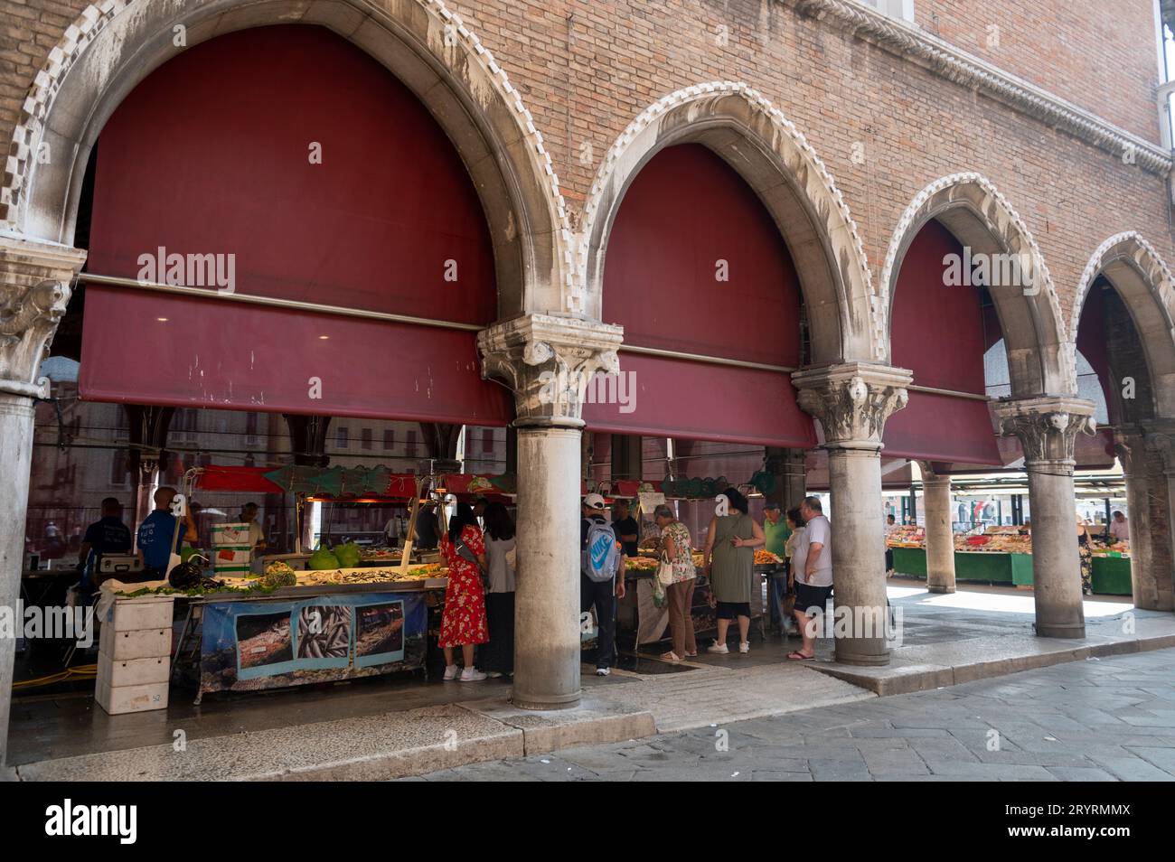 At the Neo-Gothic indoor Rialto fish market at the Peschiera Fratelli ...