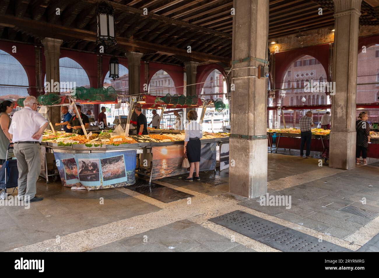 At the Neo-Gothic indoor Rialto fish market at the Peschiera Fratelli ...