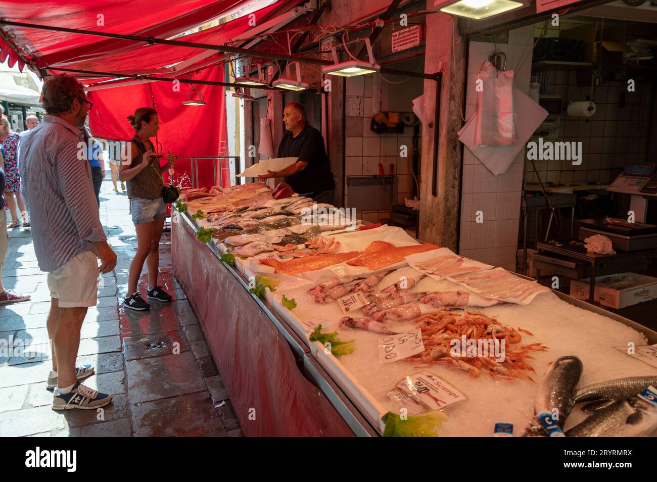 At the Neo-Gothic indoor Rialto fish market at the Peschiera Fratelli ...