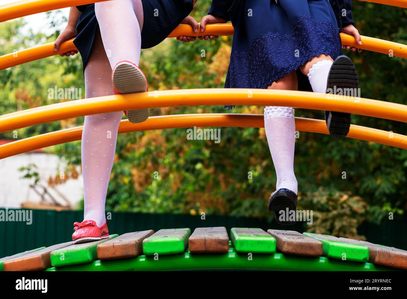 Schoolgirls. schoolgirl feet. Concept school days Stock Photo - Alamy