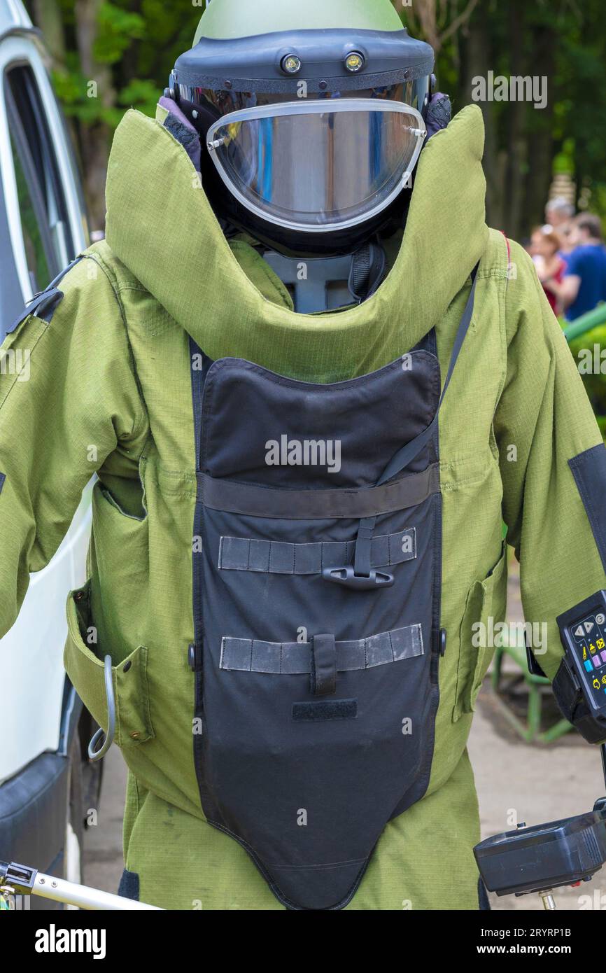 Armor costume consisting of a steel helmet. The concept of demining of ...