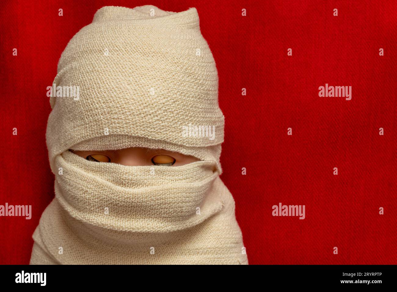 The man is wrapped in a cloth. The body is shrouded in a veil. The ...