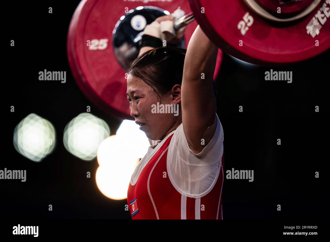 Rim Unsim of North Korea competes as she breaks the world record during ...