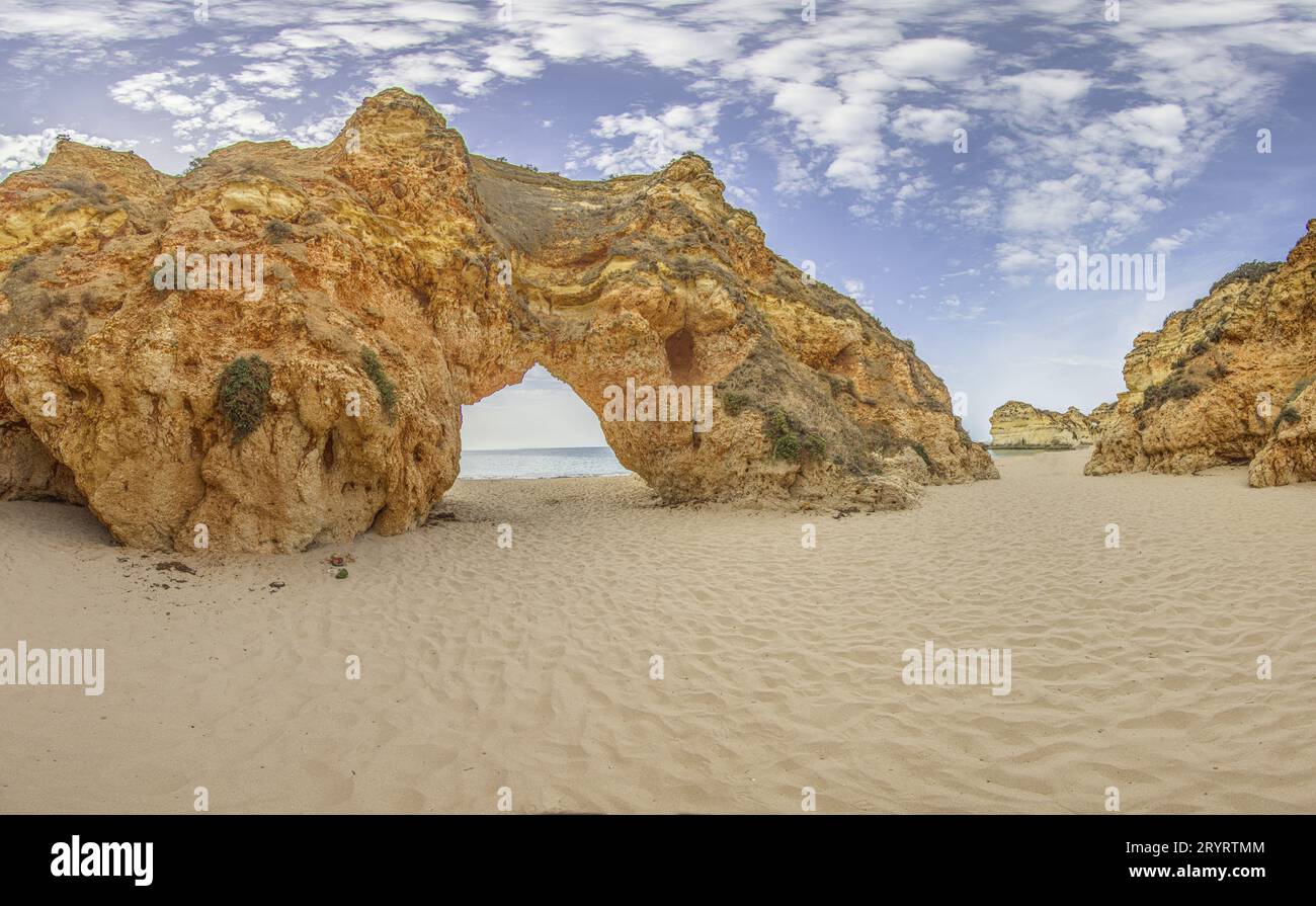 This stock photo features an aerial view of a sun-drenched beach ...
