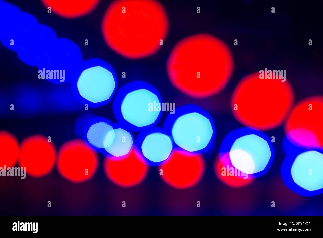 Abstract Blue Red bokeh lights and reflections. Festive background of ...