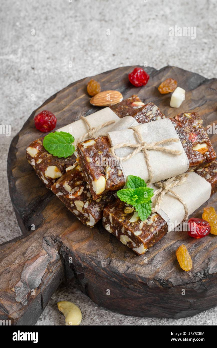 Healthy snack bars of dried fruits and nuts on gray background Stock ...