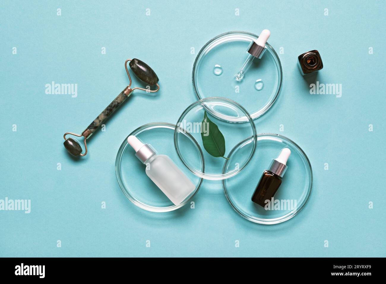 Abstract cosmetic laboratory with chemical glassware and cosmetic ...