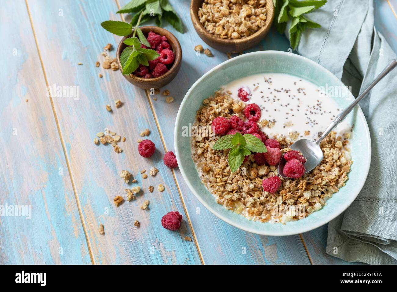 Healthy breakfast cereal bowl homemade granola with fresh raspberry and ...