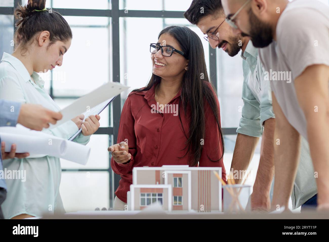 Architect discuss with engineer about project in office, architectural ...