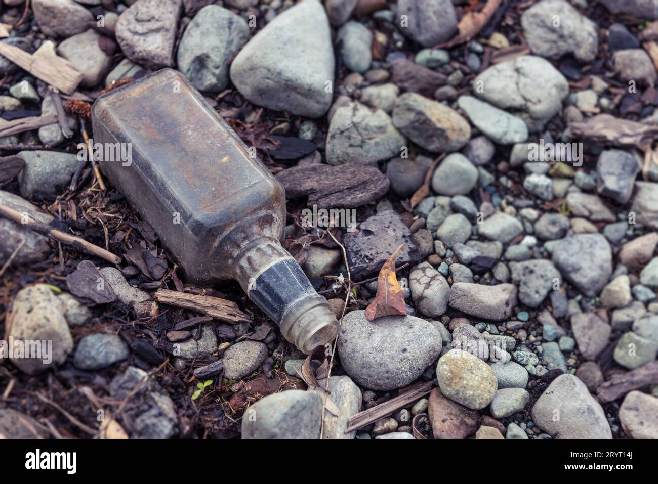 Glass bottle thrown on the ground hi-res stock photography and images ...