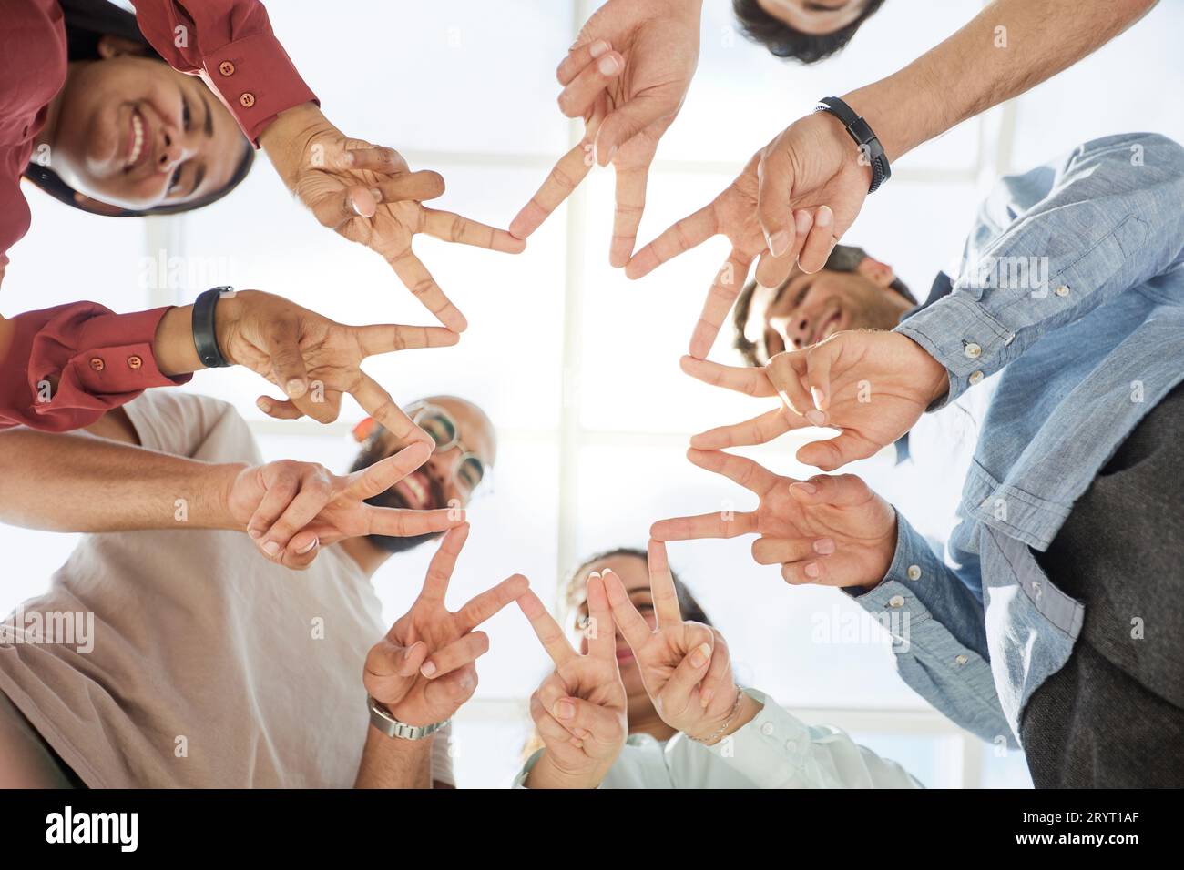 Forming a star shape with fingers, view from below Stock Photo - Alamy