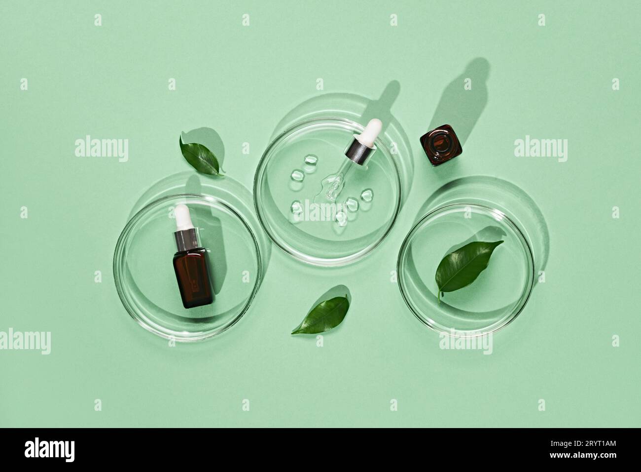 Abstract cosmetic laboratory with chemical glassware and cosmetic ...