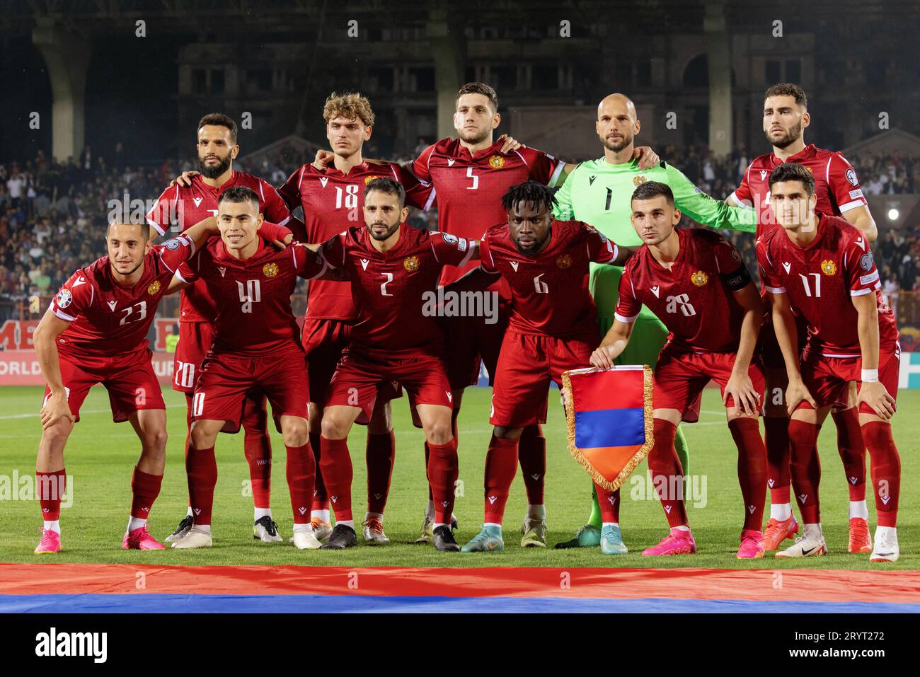 The Armenian football players stand in formation for a team photo ...