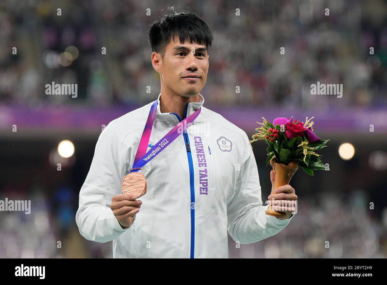 Bronze medalist Taiwan's Yang Chun-Han celebrates on the podium during ...