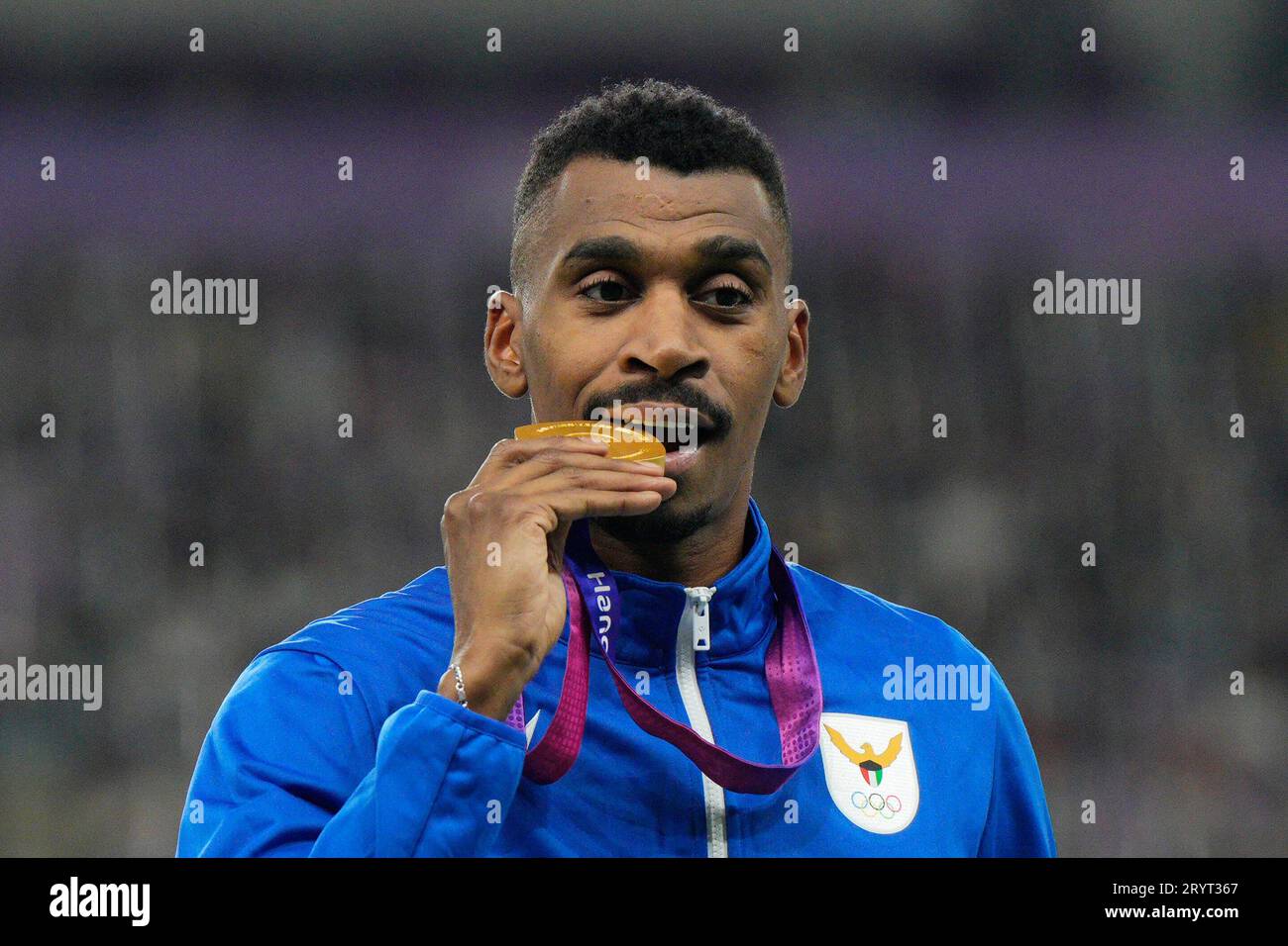 Gold medalist Kuwait's Yaqoub Alyouha celebrates on the podium during ...