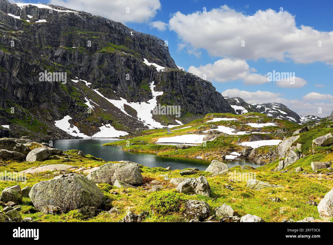 Snow is reflected in the icy water Stock Photo - Alamy