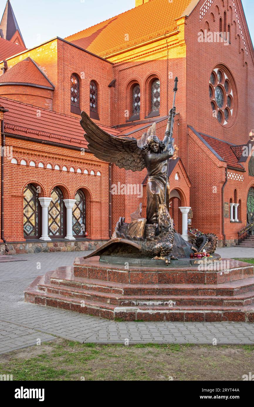 Sculpture of Saint Archangel Michael in front of church of Saints Simon ...