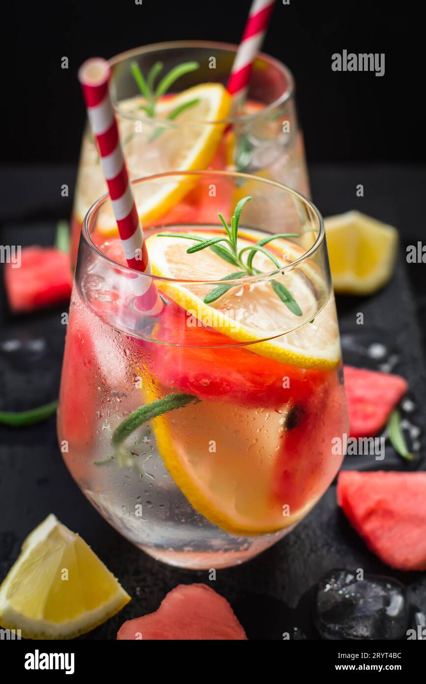 Watermelon lemon rosemary lemonade with pieces of watermelon in shape ...