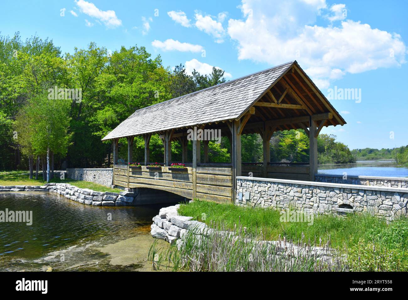 Covered bridge nestled near downtown Alpena Stock Photo - Alamy