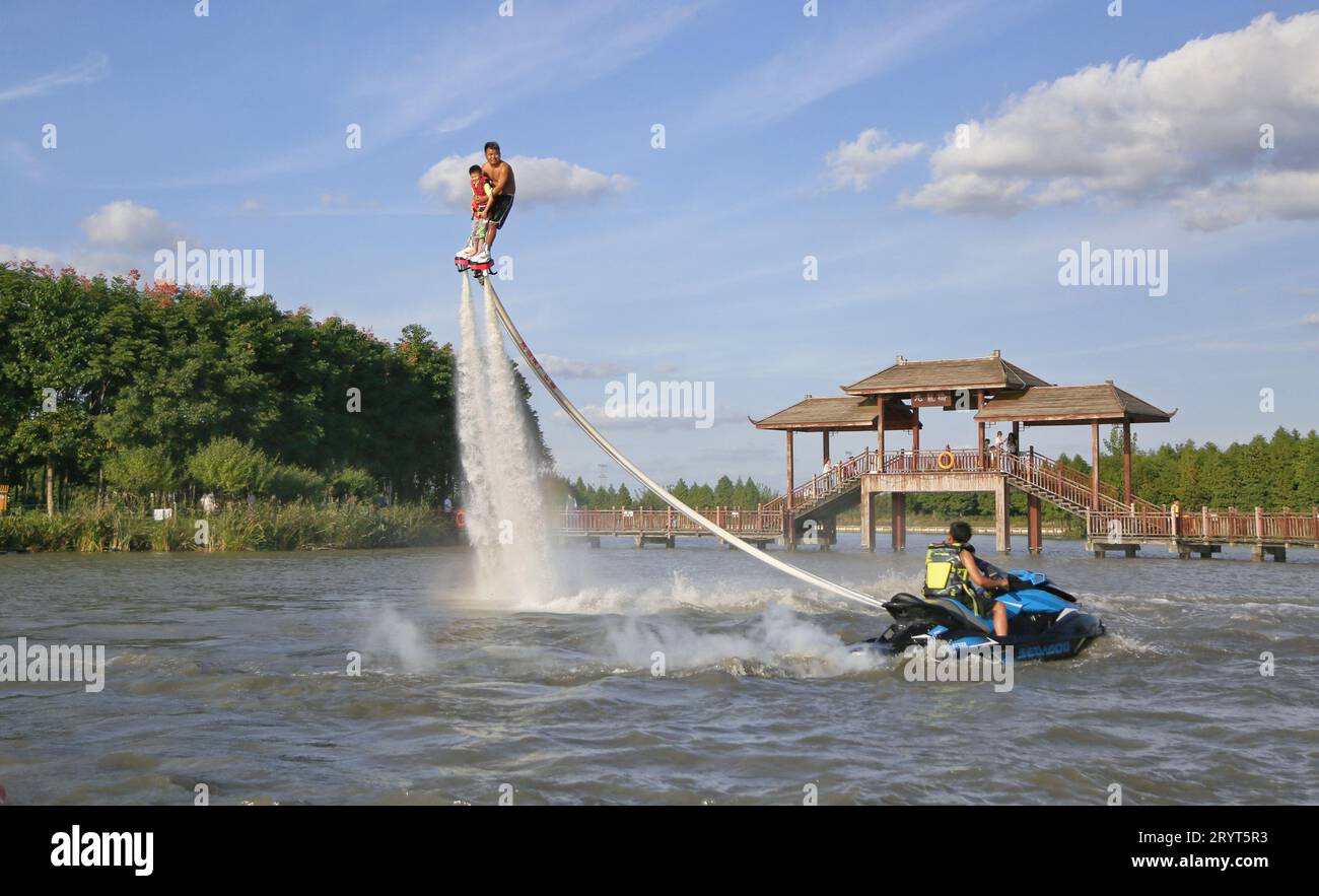 HAI'AN, CHINA- OCTOBER 2, 2023 - Tourists experience a flying man on ...