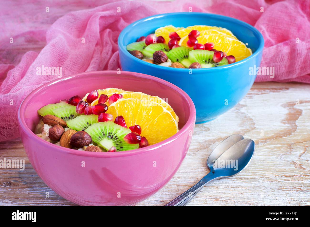 Oatmeal with fruit and nuts for a healthy breakfast Stock Photo - Alamy