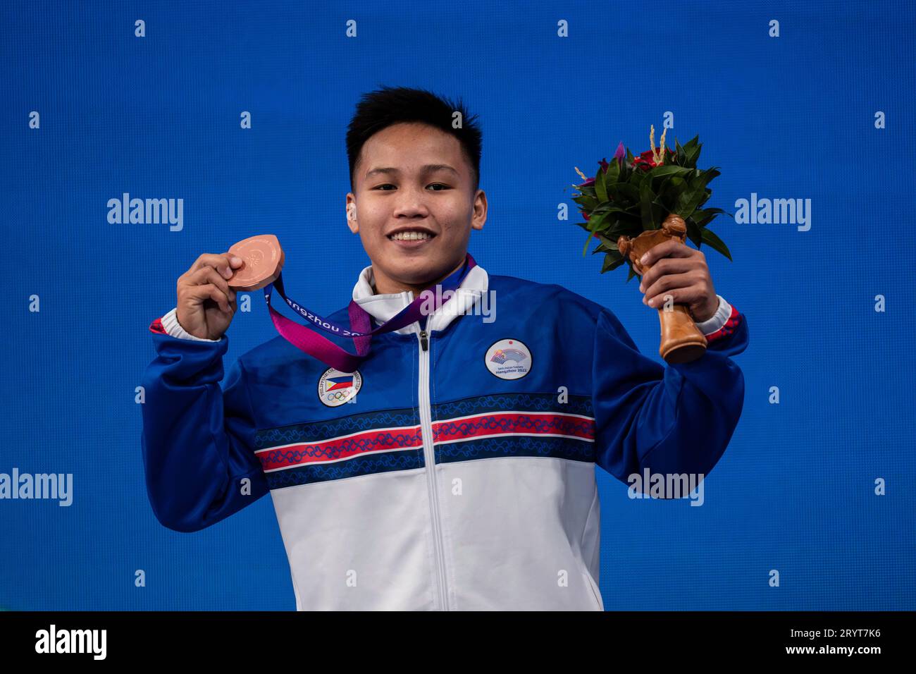 Philippines' Ando Elreen reacts with her bronze medal during the awards ...