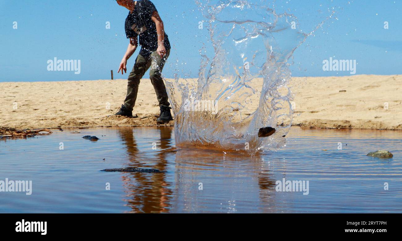 Throwing rocks hi-res stock photography and images - Alamy