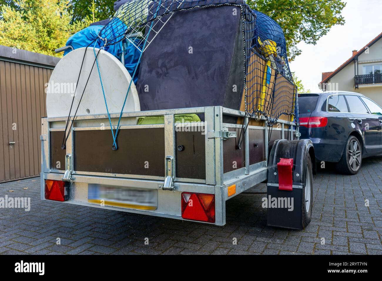 Trailer with bulky waste from a household clearance Stock Photo - Alamy